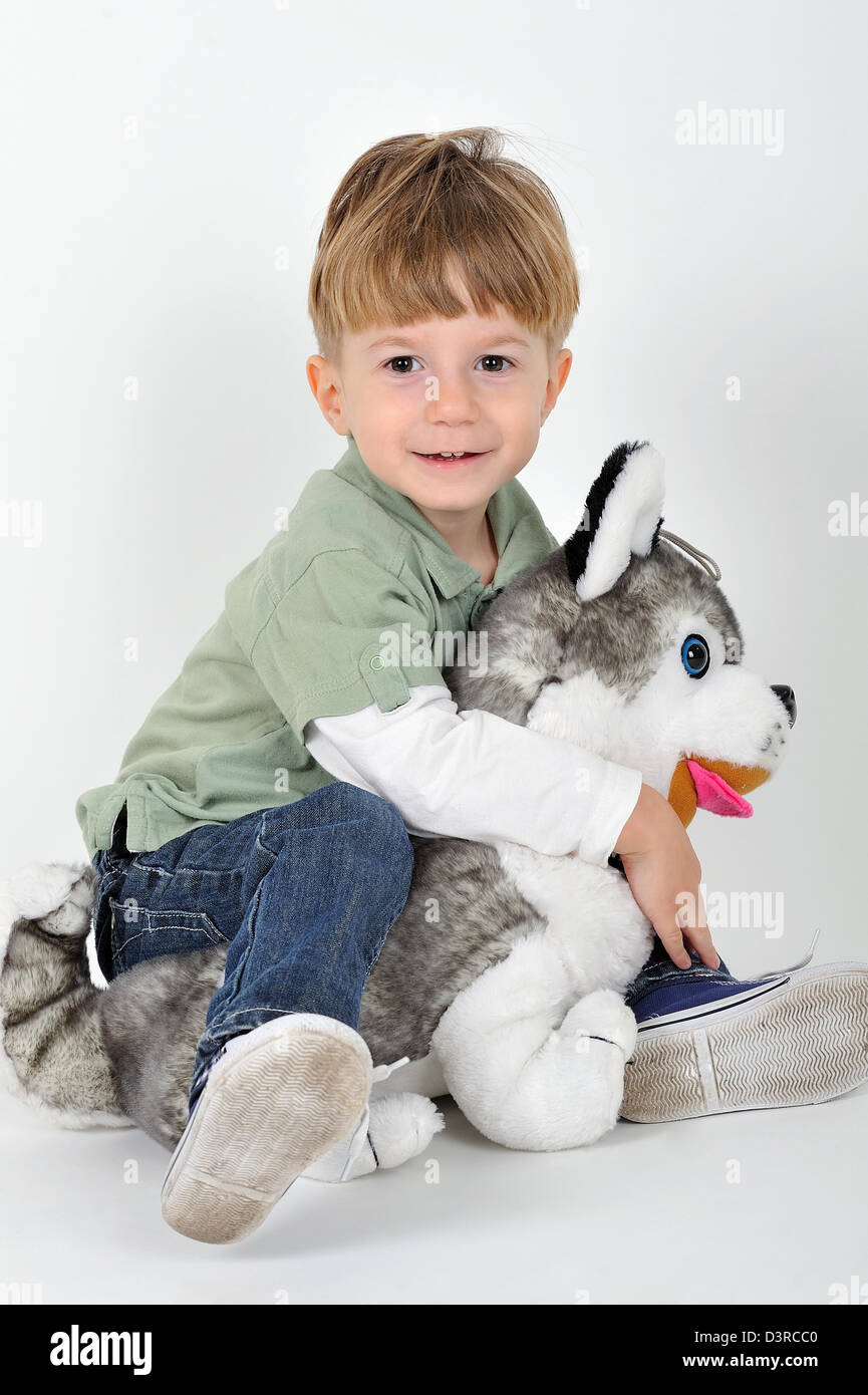 kid with a teddy dog Stock Photo - Alamy