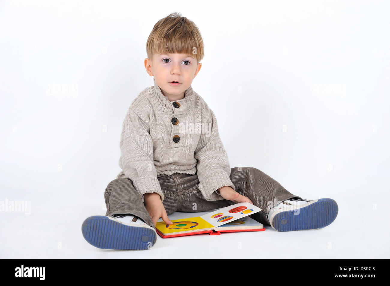 boy with a book Stock Photo - Alamy
