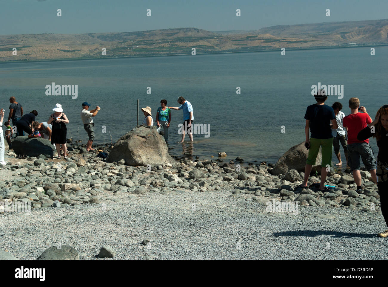 Wading into sea hi-res stock photography and images - Alamy