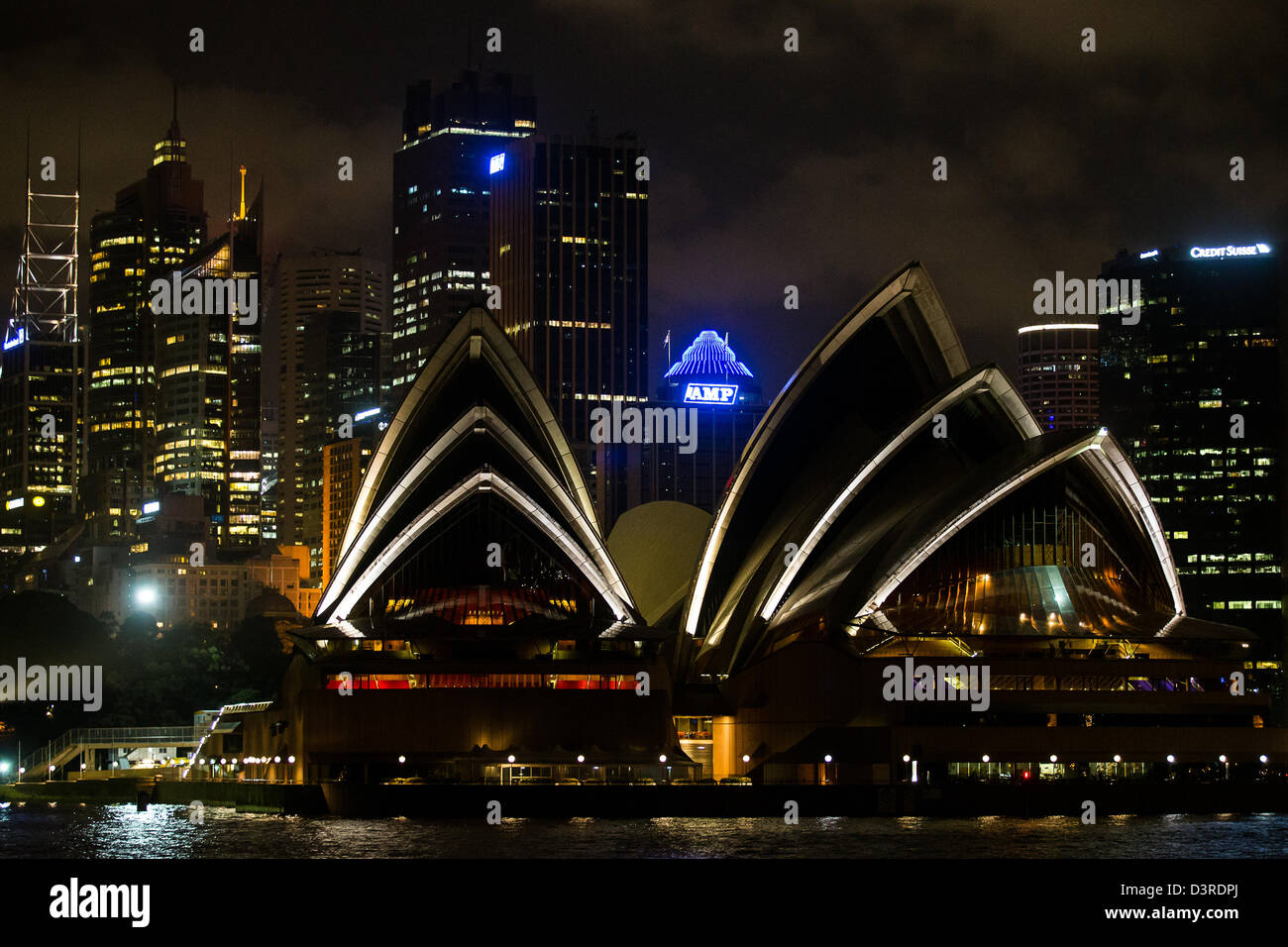 The Sydney Opera House and downtown at night Stock Photo - Alamy