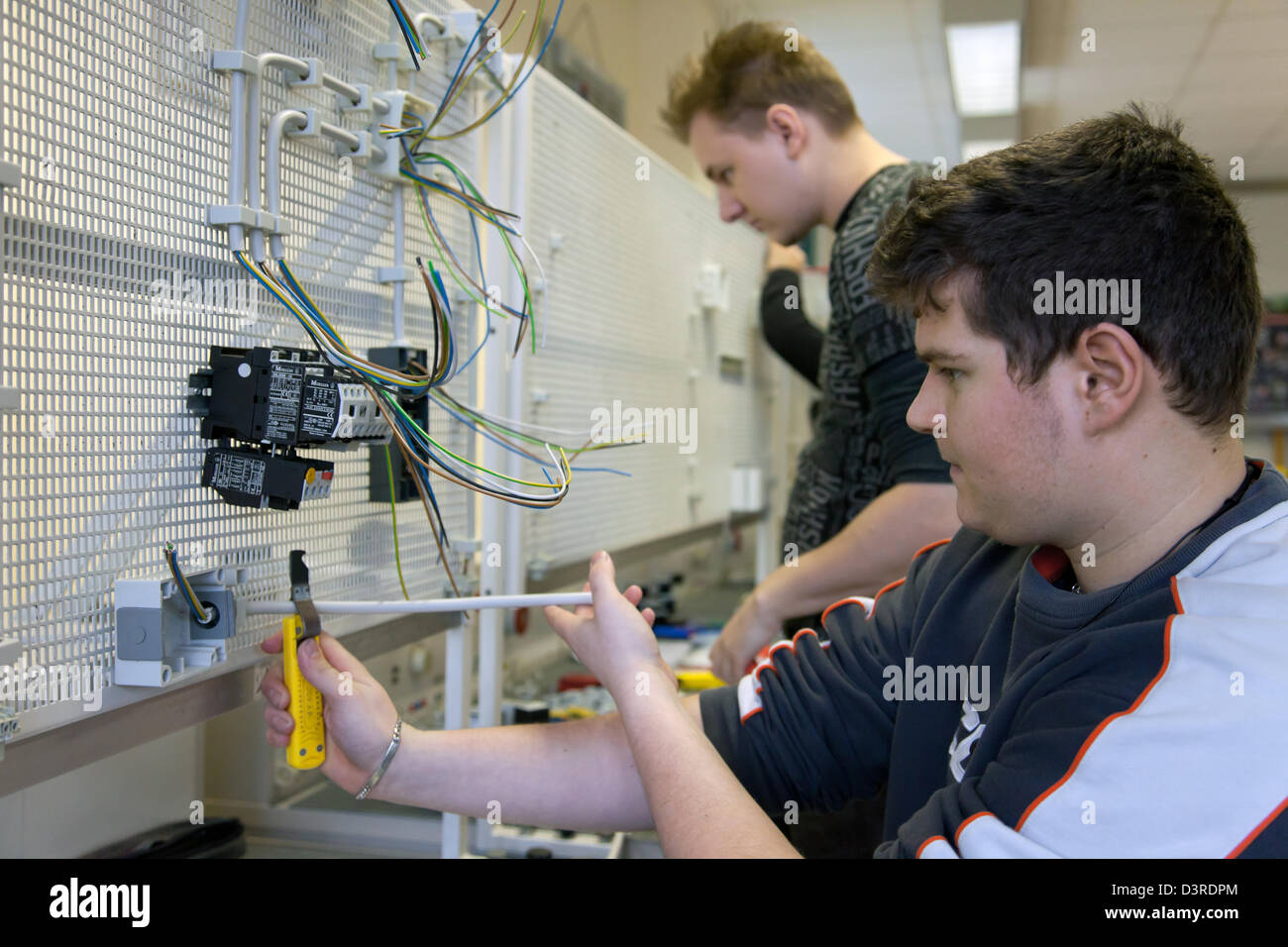 Berlin, Germany, electricians learn to install electrical systems Stock ...