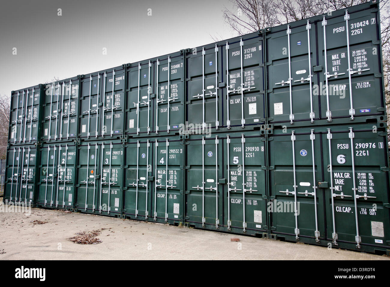 Shipping containers in a distribution storage yard Stock Photo - Alamy