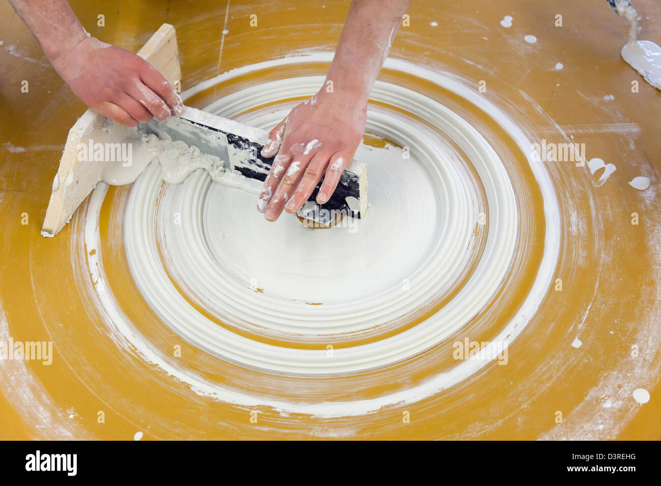 Berlin, Germany, plasterer apprentices in creating plaster rings Stock ...