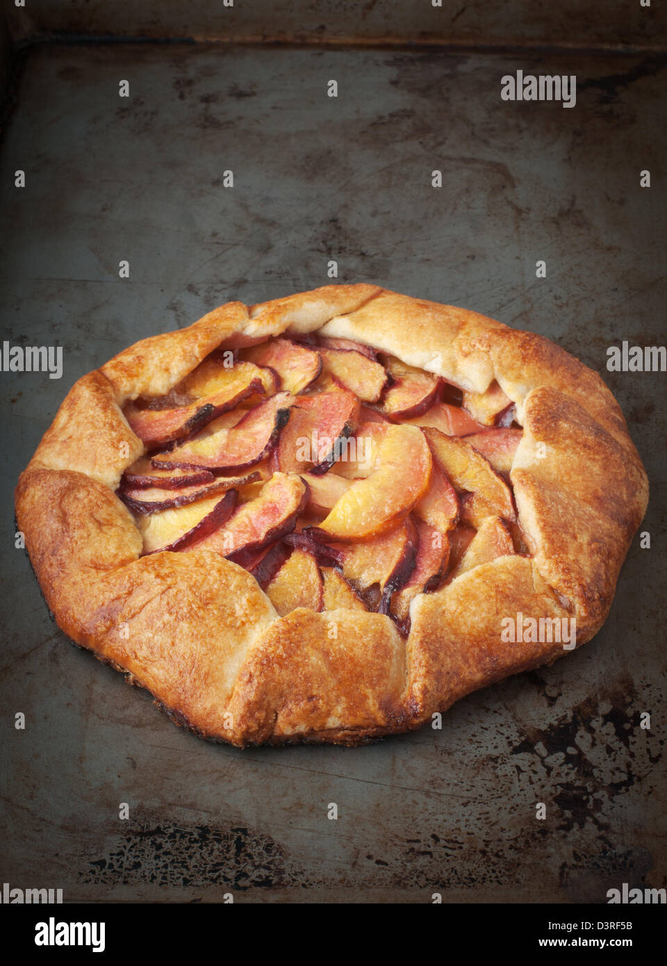Golden pastry fresh nectarine baked French galette Stock Photo - Alamy