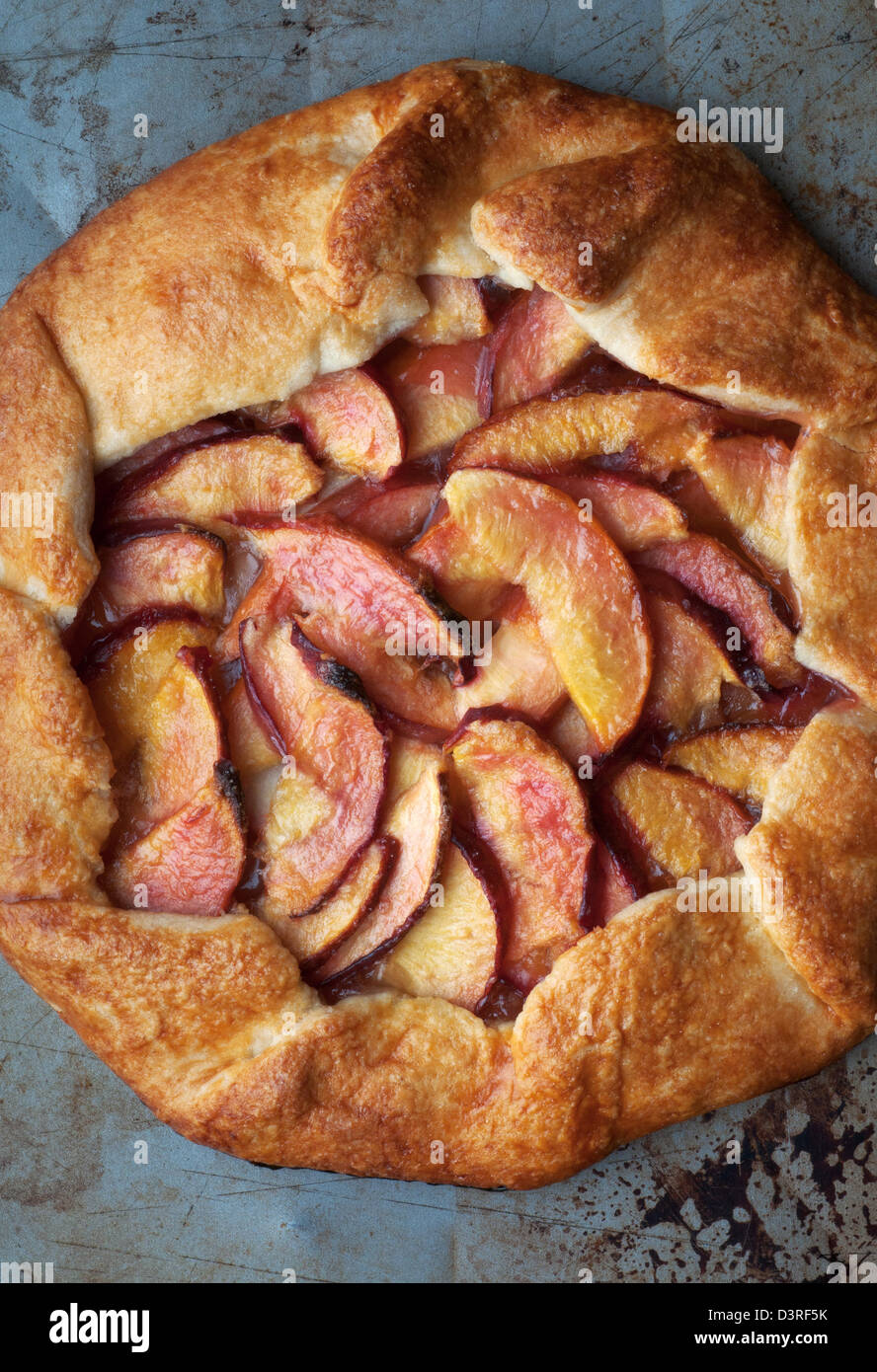 Golden pastry fresh nectarine baked French galette Stock Photo - Alamy