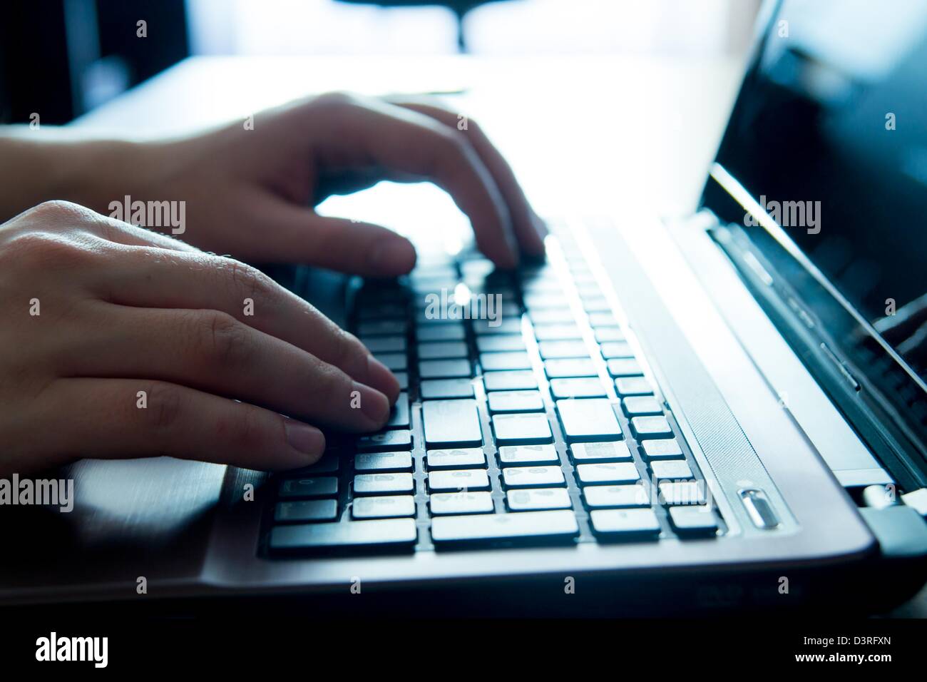 Close-up of human hands on keyboard Stock Photo - Alamy