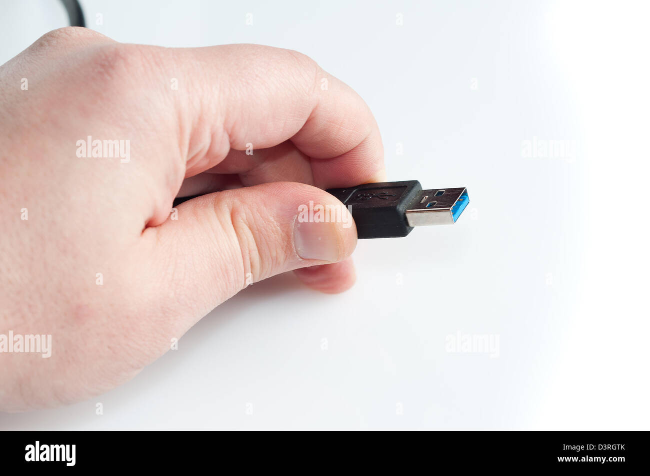 Hand with USB 3.0 cable Stock Photo - Alamy