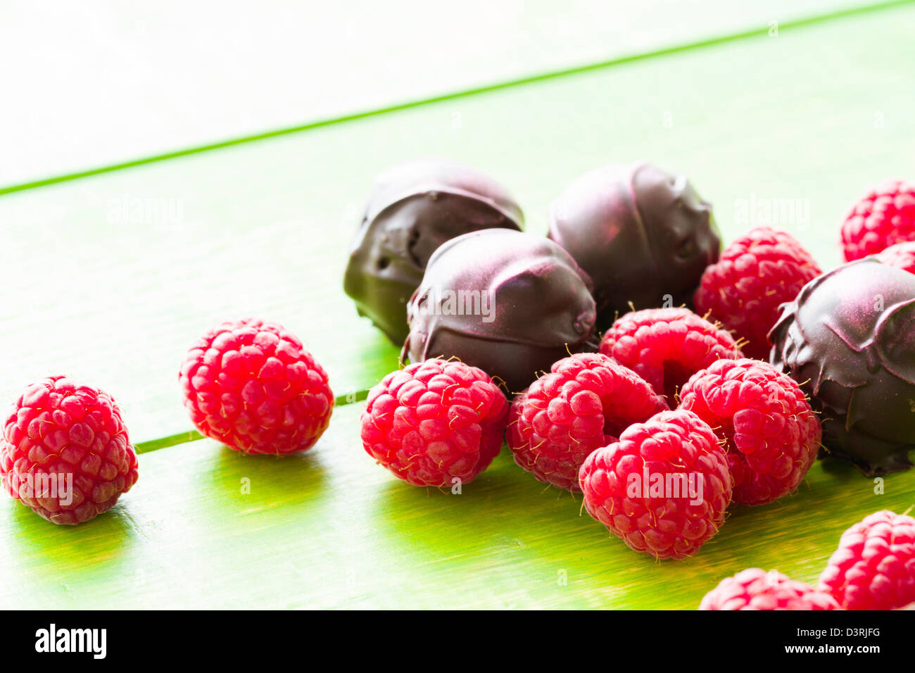 Gourmet raspberry truffles hand made by chocolatier Stock Photo - Alamy
