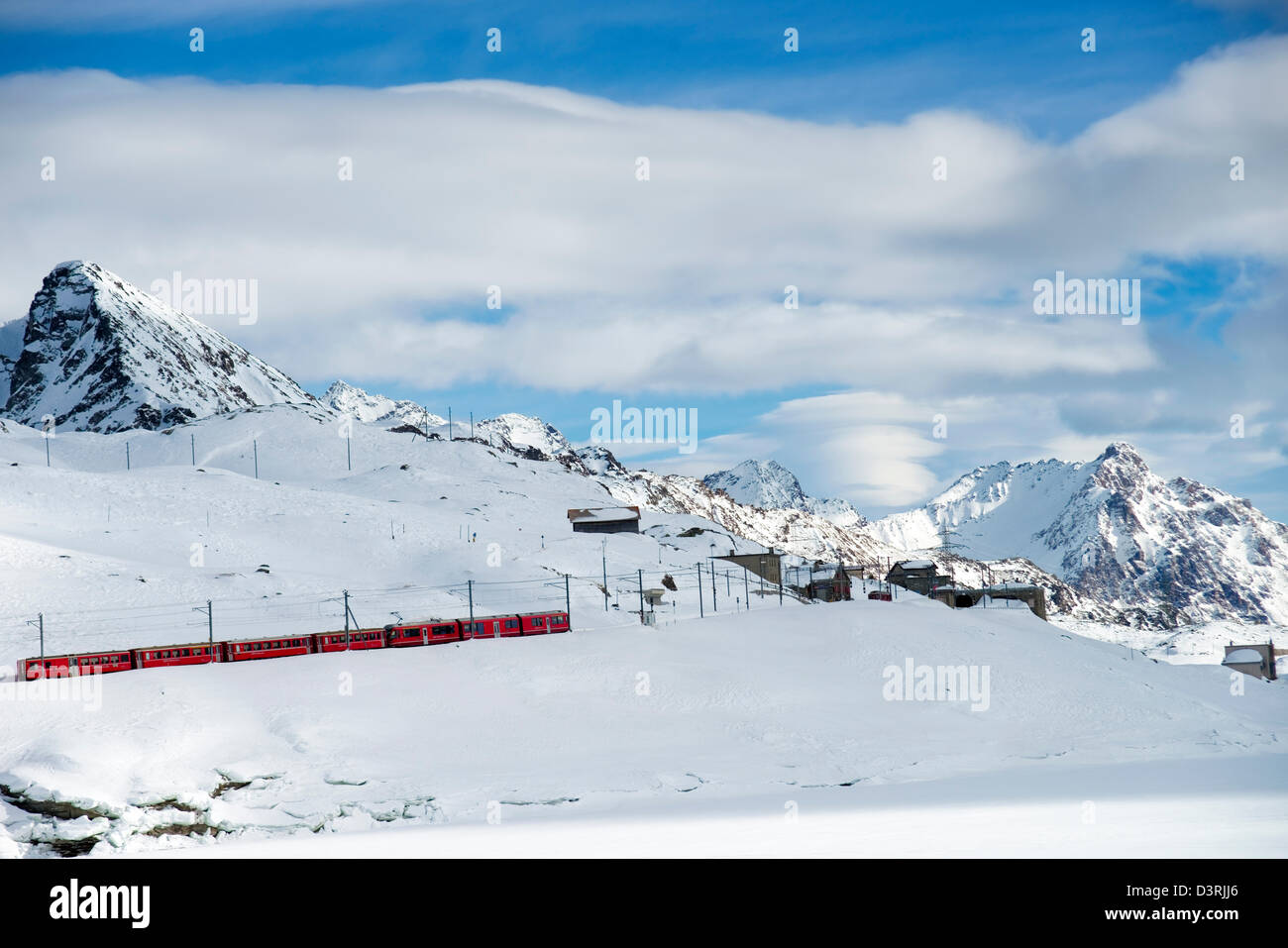 Mountain train at Lago Bianco Bernina Pass in Winter, Grisons ...