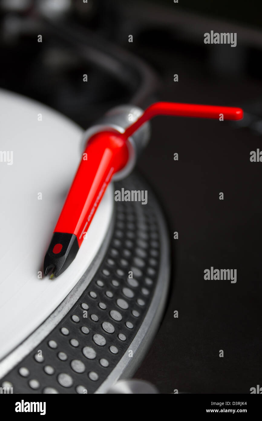 Professional DJ audio equipment - shperical turntable needle on white ...