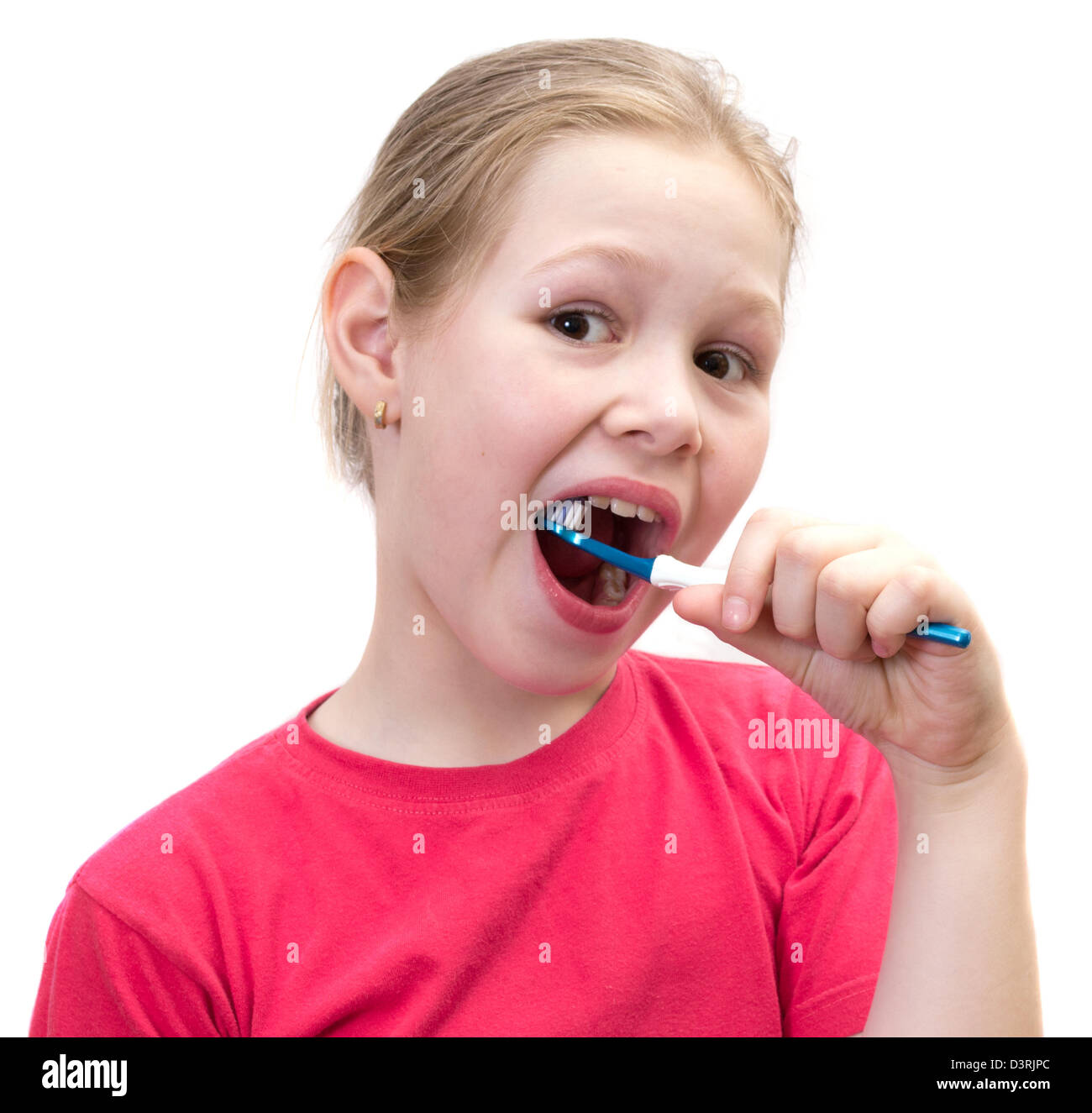 The girl brushes teeth a tooth brush Stock Photo - Alamy