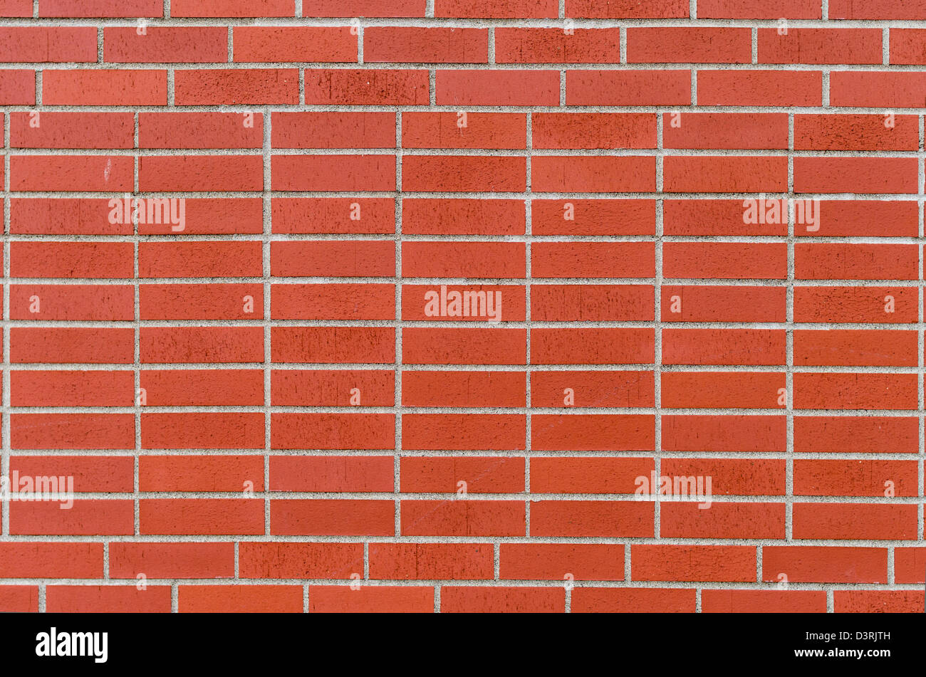 A red brick wall with changing courses for use as a background Stock ...