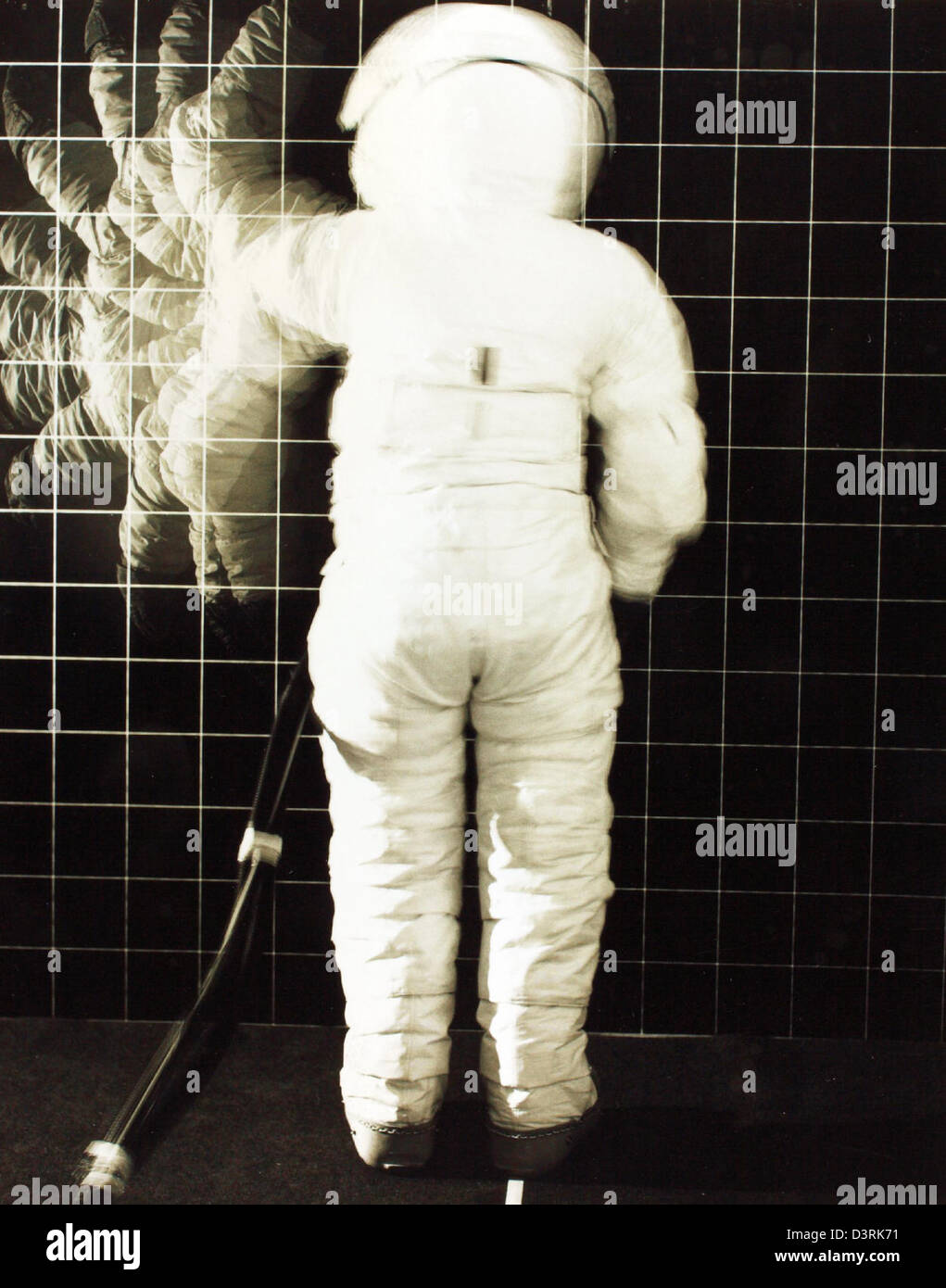 A glossy photo of NASA space suits showcases the advanced design and ...