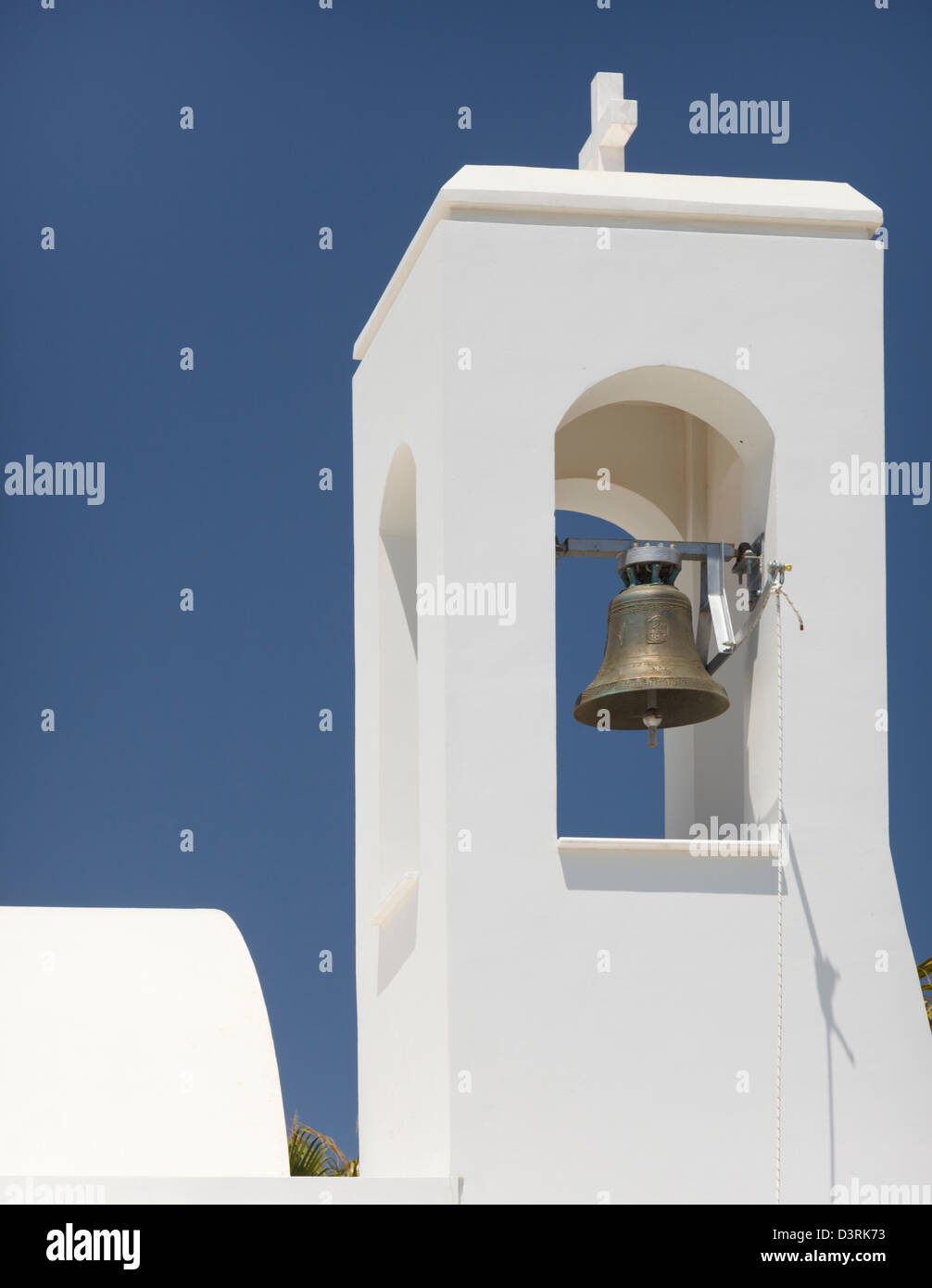 A Greek Bell Tower Set Against A Deep Blue Sky Stock Photo - Alamy