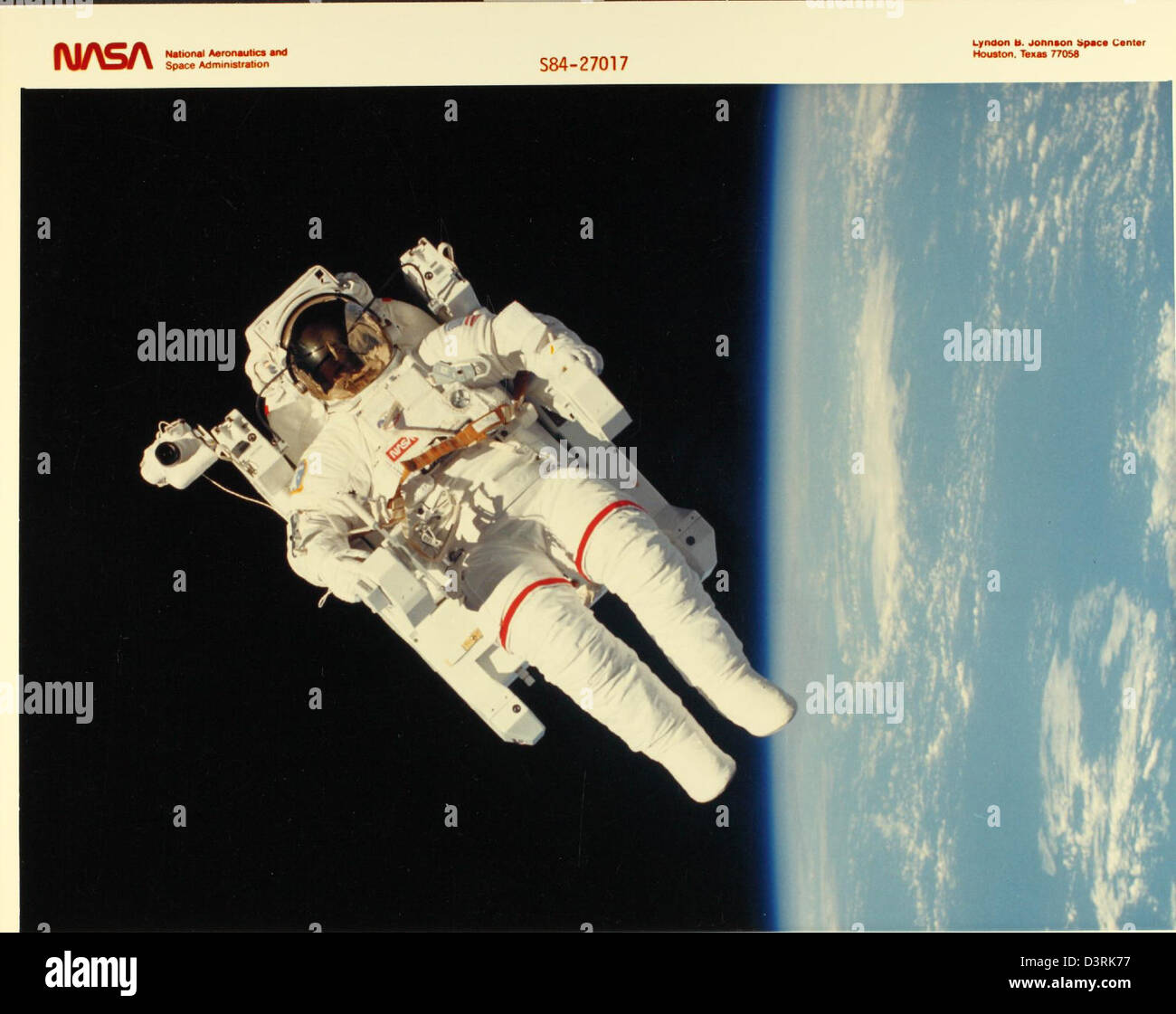 A glossy photo of a NASA space suit, showcasing the specialized ...