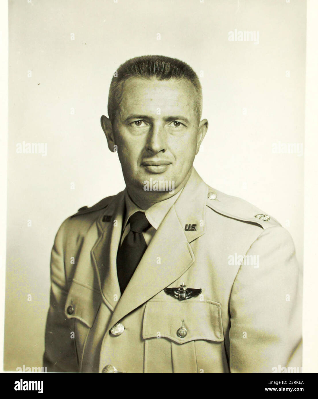 A glossy photo of NASA personnel highlights the staff members involved ...