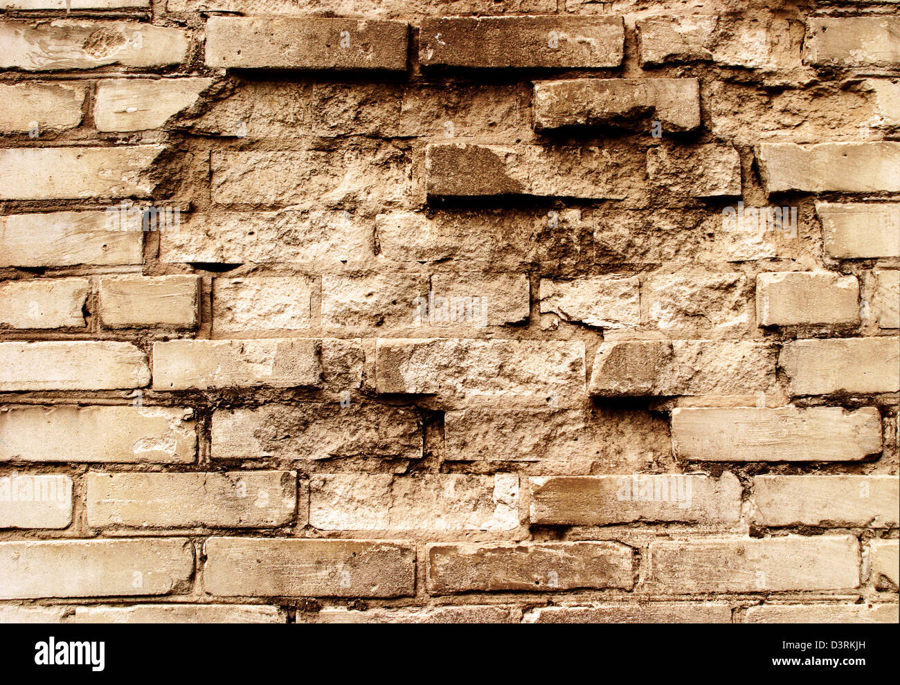 Yellow grunge brickwall with hole Stock Photo - Alamy