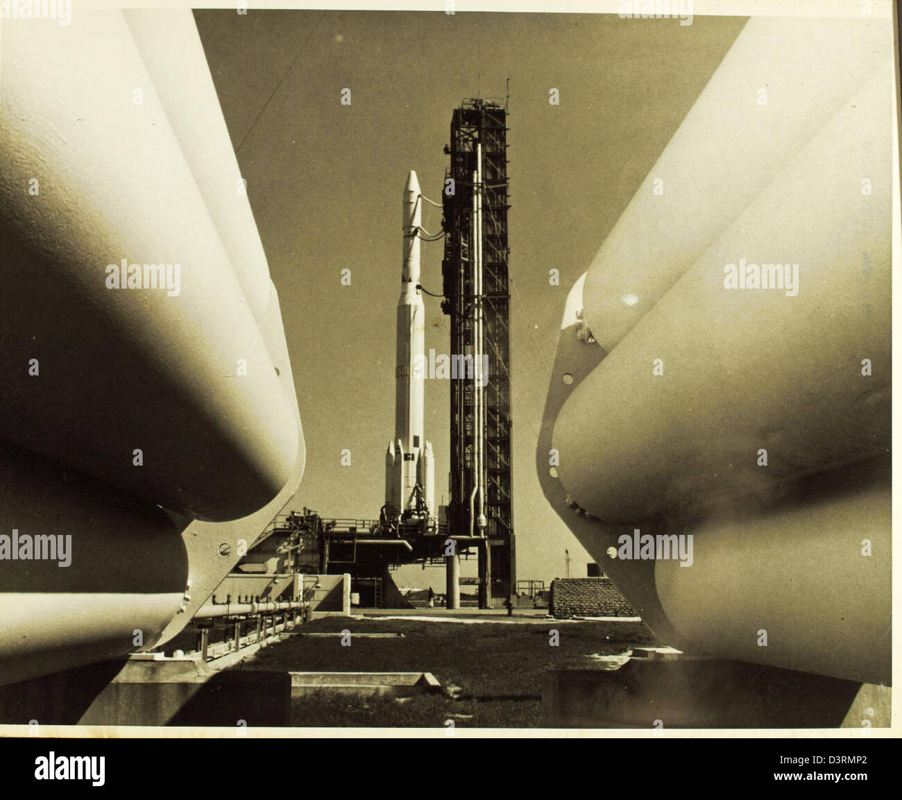 A glossy photograph of the McDonnell Douglas Delta rocket, highlighting ...