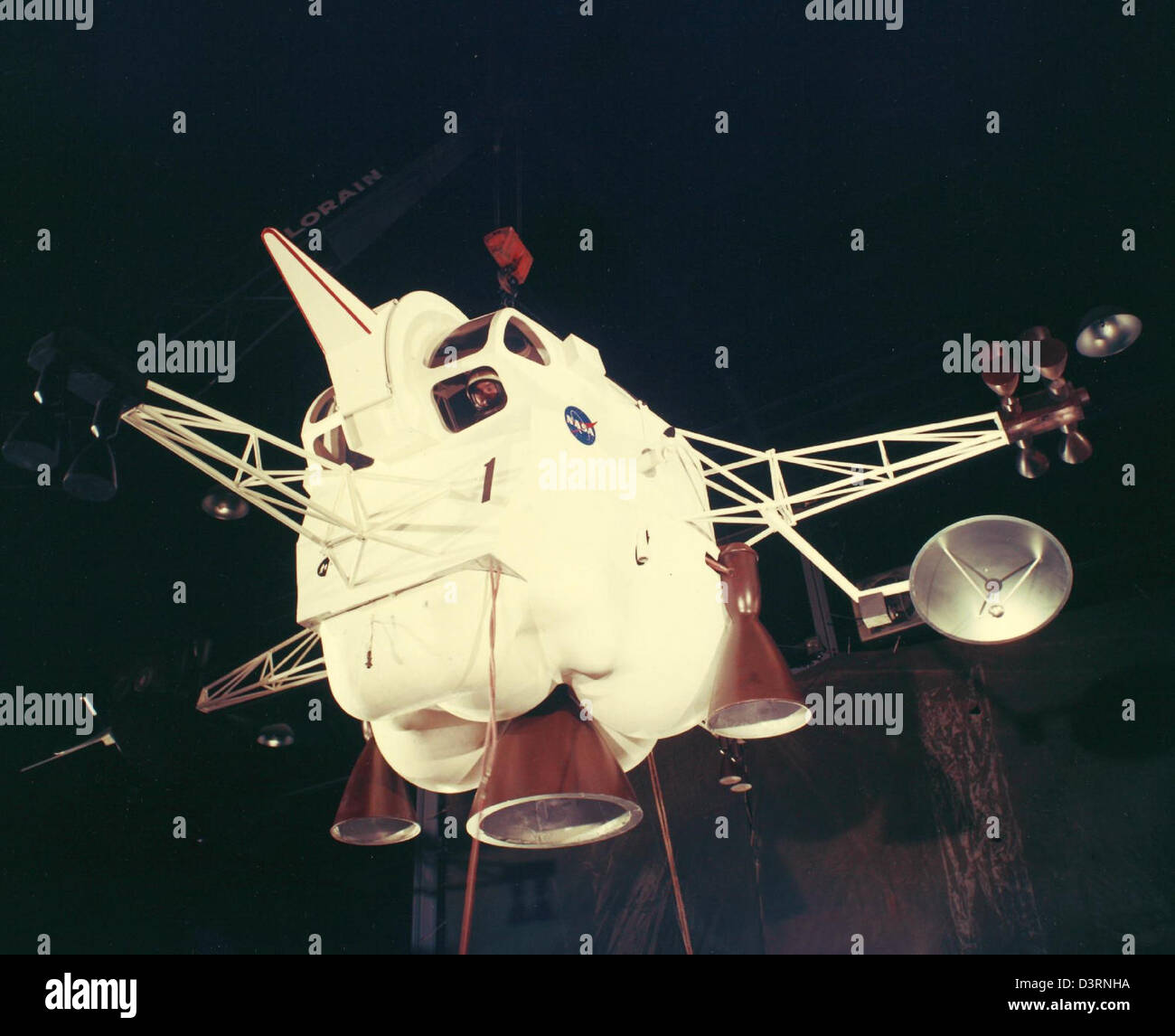 A glossy photo features the Lunar Excursion Module developed by General ...