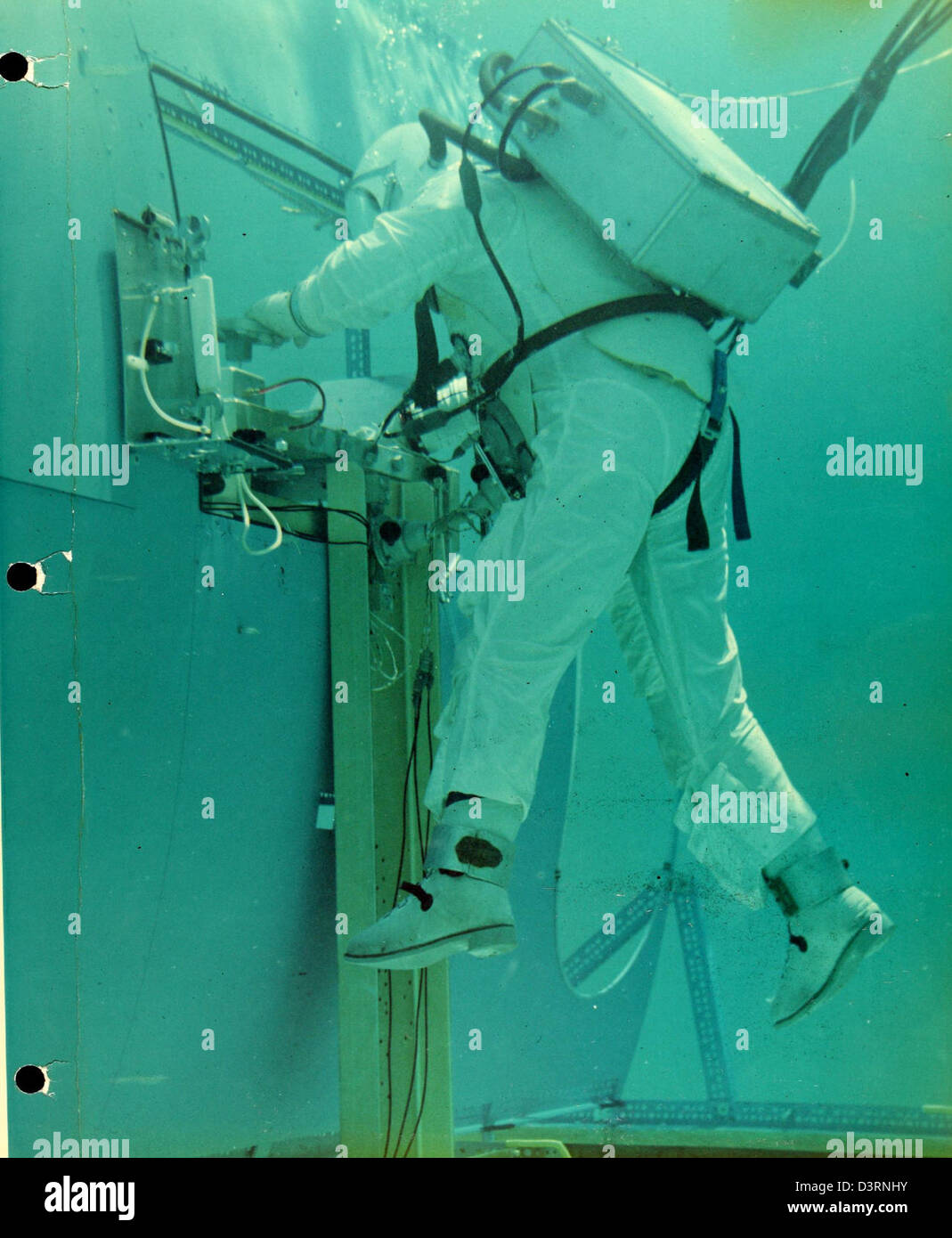 A glossy photo of NASA's space suits, designed for astronaut safety ...