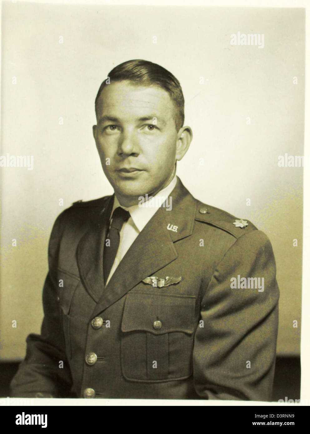 A glossy photo of NASA personnel captures the team of professionals ...