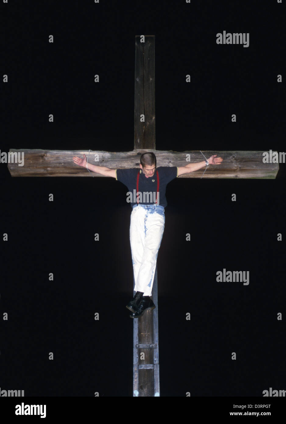 Berlin, Germany, a skinhead hangs on a cross (Crucified Skinhead Stock ...