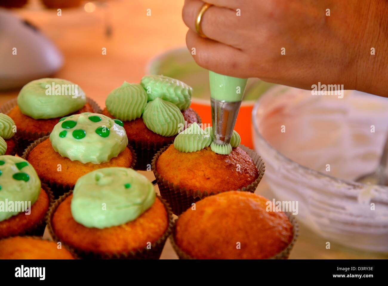 The making of some tastefully sweet capecakes Stock Photo - Alamy
