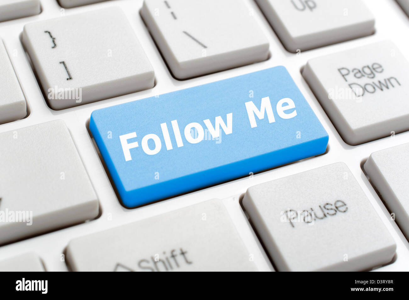 Follow me on keyboard Stock Photo - Alamy