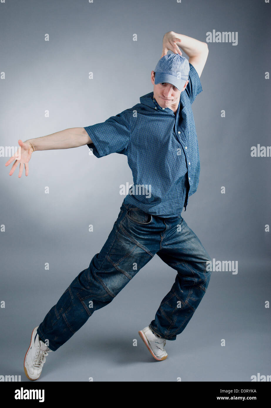 hip-hop style dancer posing. cool looking dancer posing Stock Photo - Alamy
