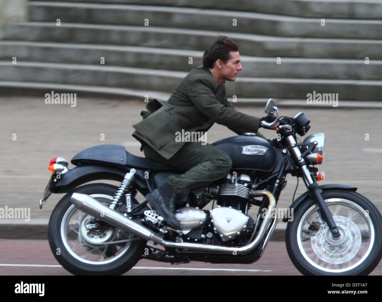 London, UK, 24th February 2013: Tom Cruise seen riding on a Triumph ...