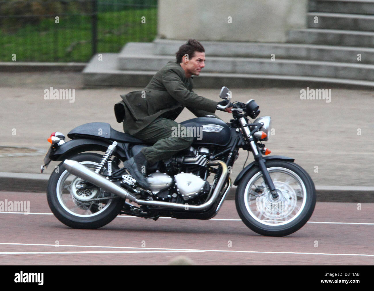 London, UK, 24th February 2013: Tom Cruise seen riding on a Triumph ...