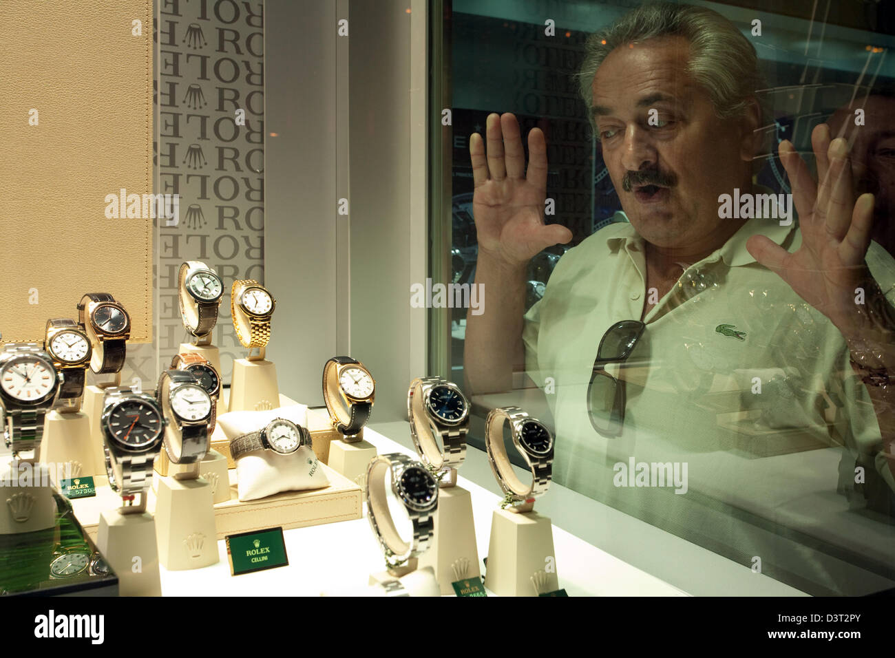 Playa de las Americas, Spain, tourists admire luxury watches in a shop ...