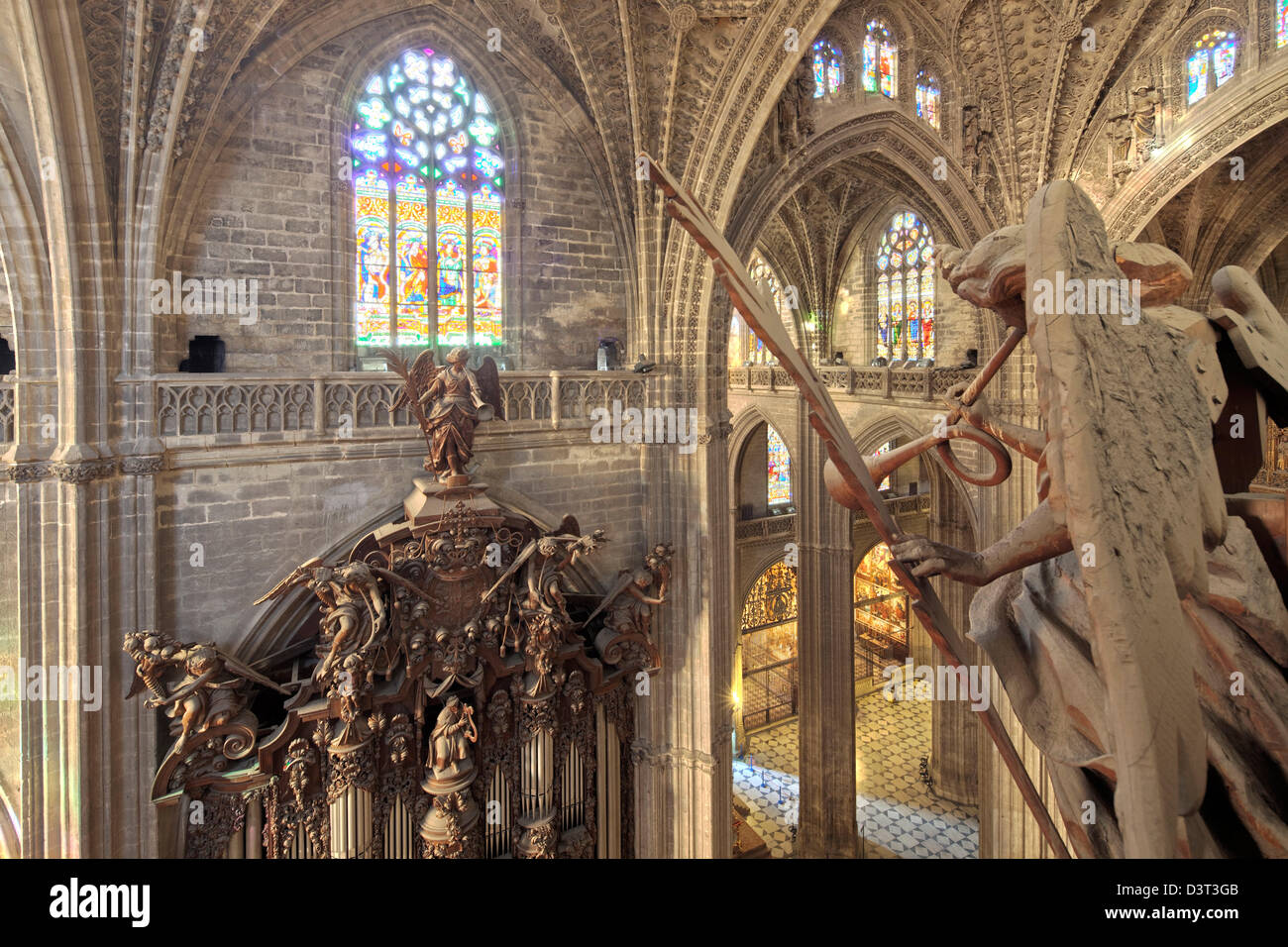 Seville, Spain, the organ with carved wooden angels in the Santa Maria ...