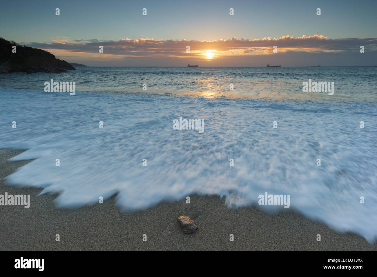 Sunrise from Swanpool beach in Cornwall Stock Photo - Alamy