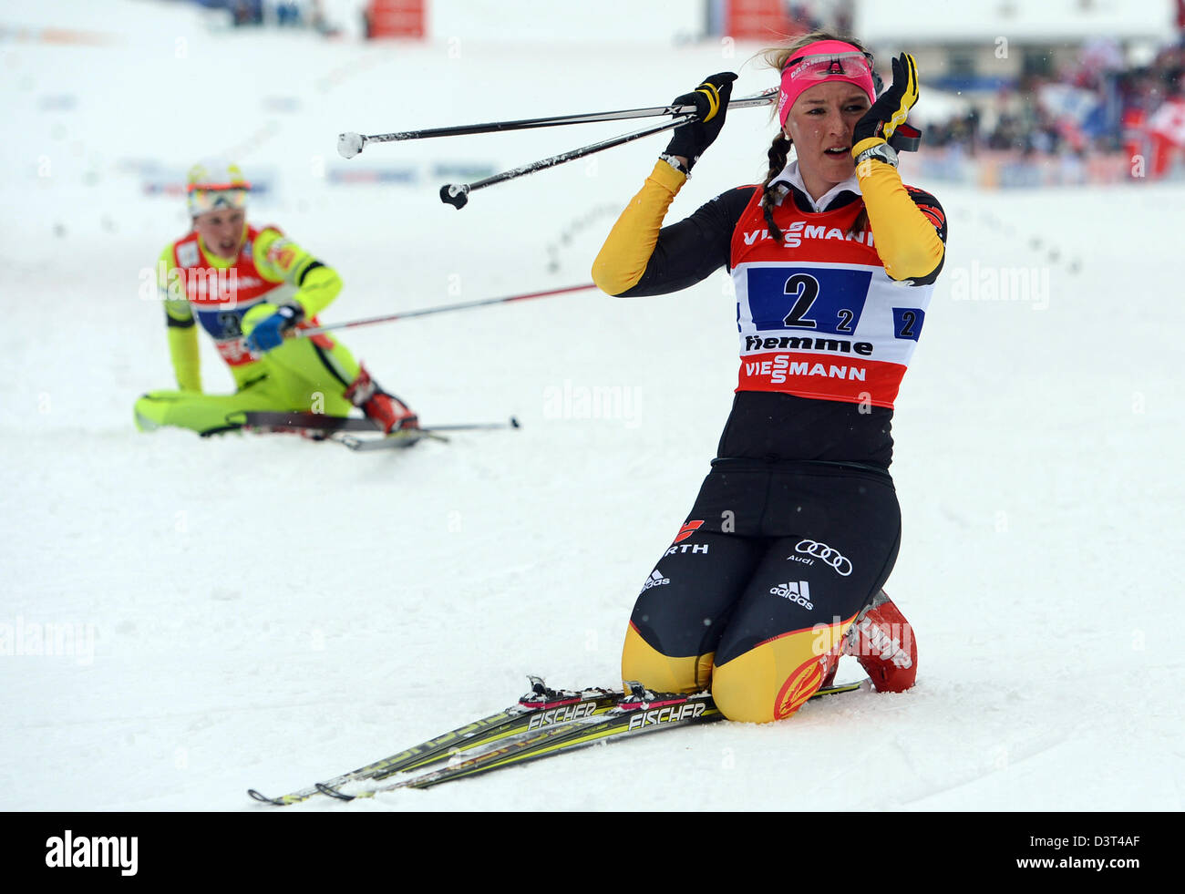 Val di Fiemme, Italy. 24th Feb, 2013. Denise Herrmann of Germany (R ...