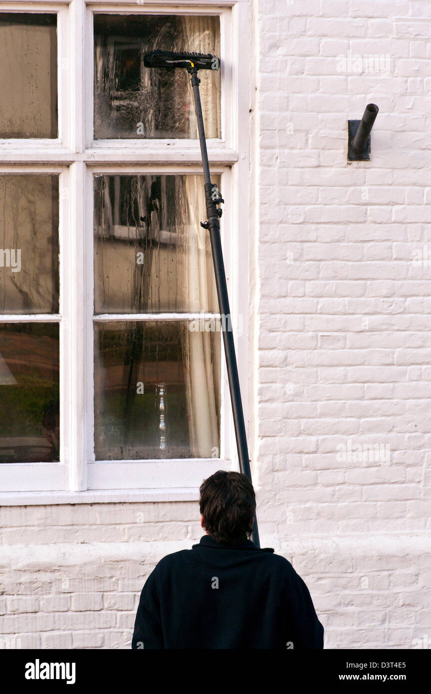 Person washing cleaning windows hi-res stock photography and images - Alamy