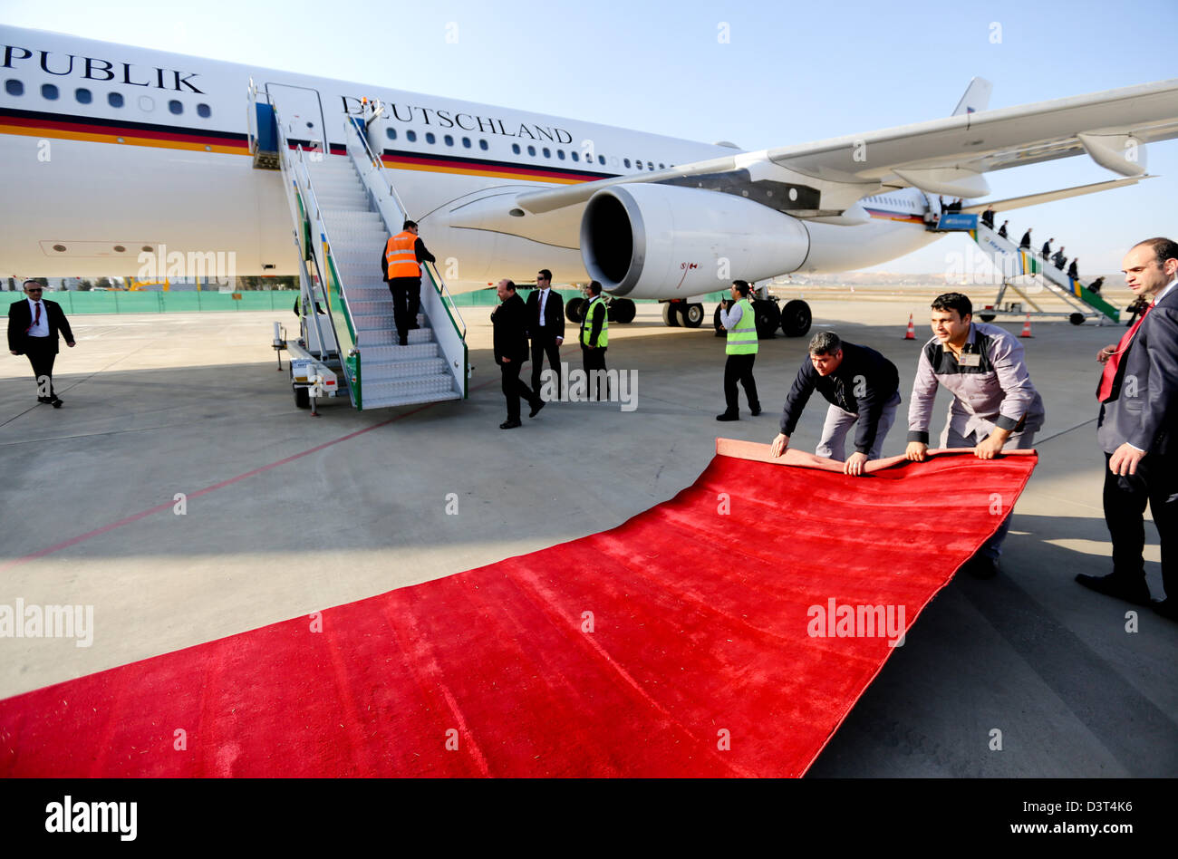 The red carpet is rolled out as Chancellor Angela Merkel in a German ...