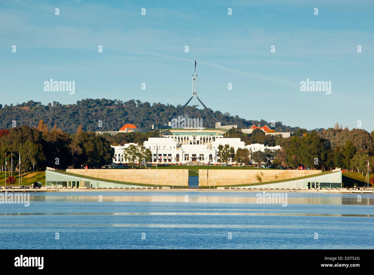 View across Lake Burley Griffin to old and new Parliament House. Canberra, Australian Capital ...