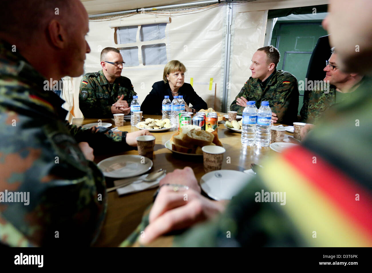 German Chancellor Angela Merkel (C) visits German soldiers in ...