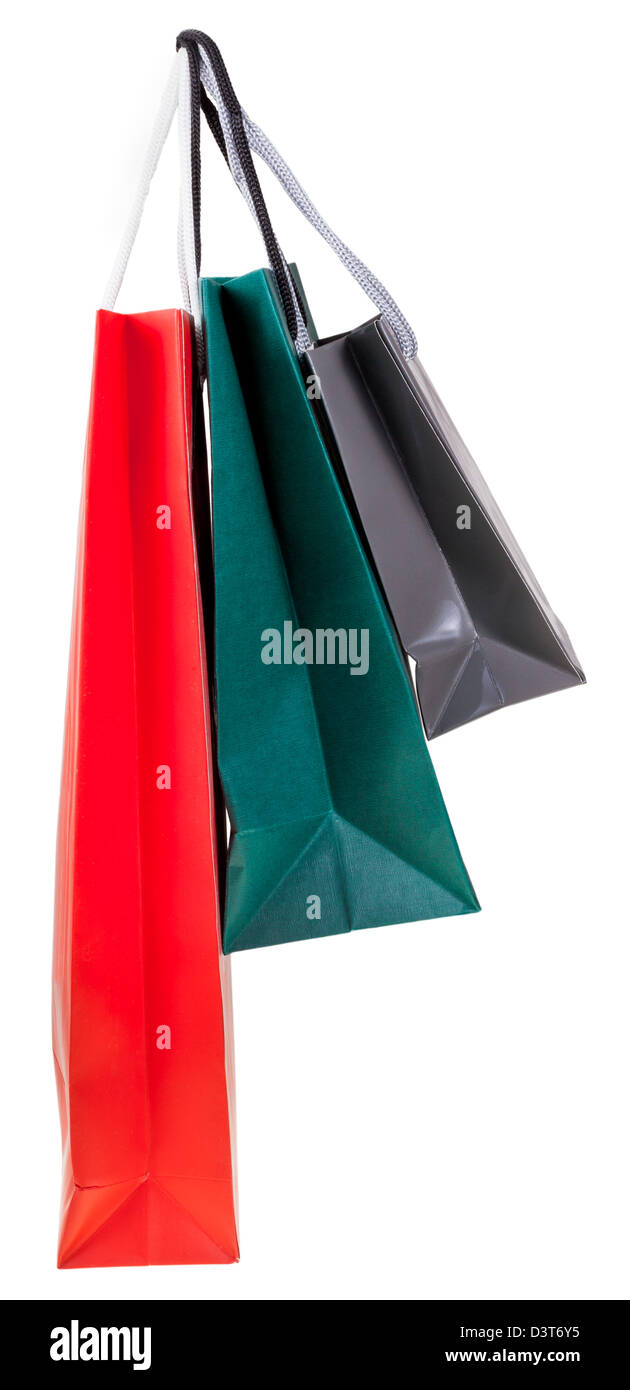 three paper shopping bags isolated on white backgrounds Stock Photo - Alamy