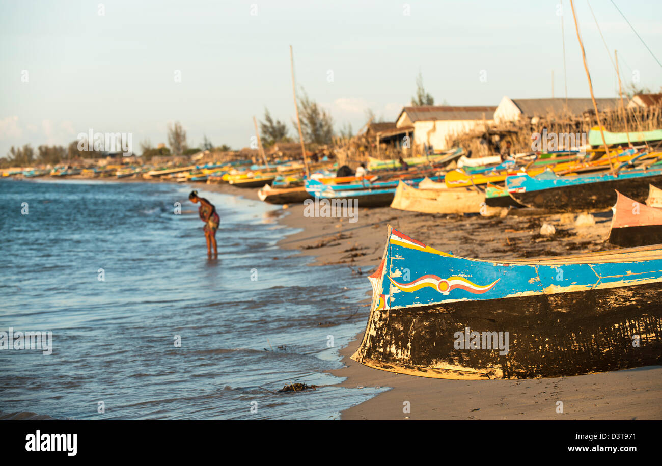 Traditional fishing boats on the shore at sunset Vezo fisherman village ...
