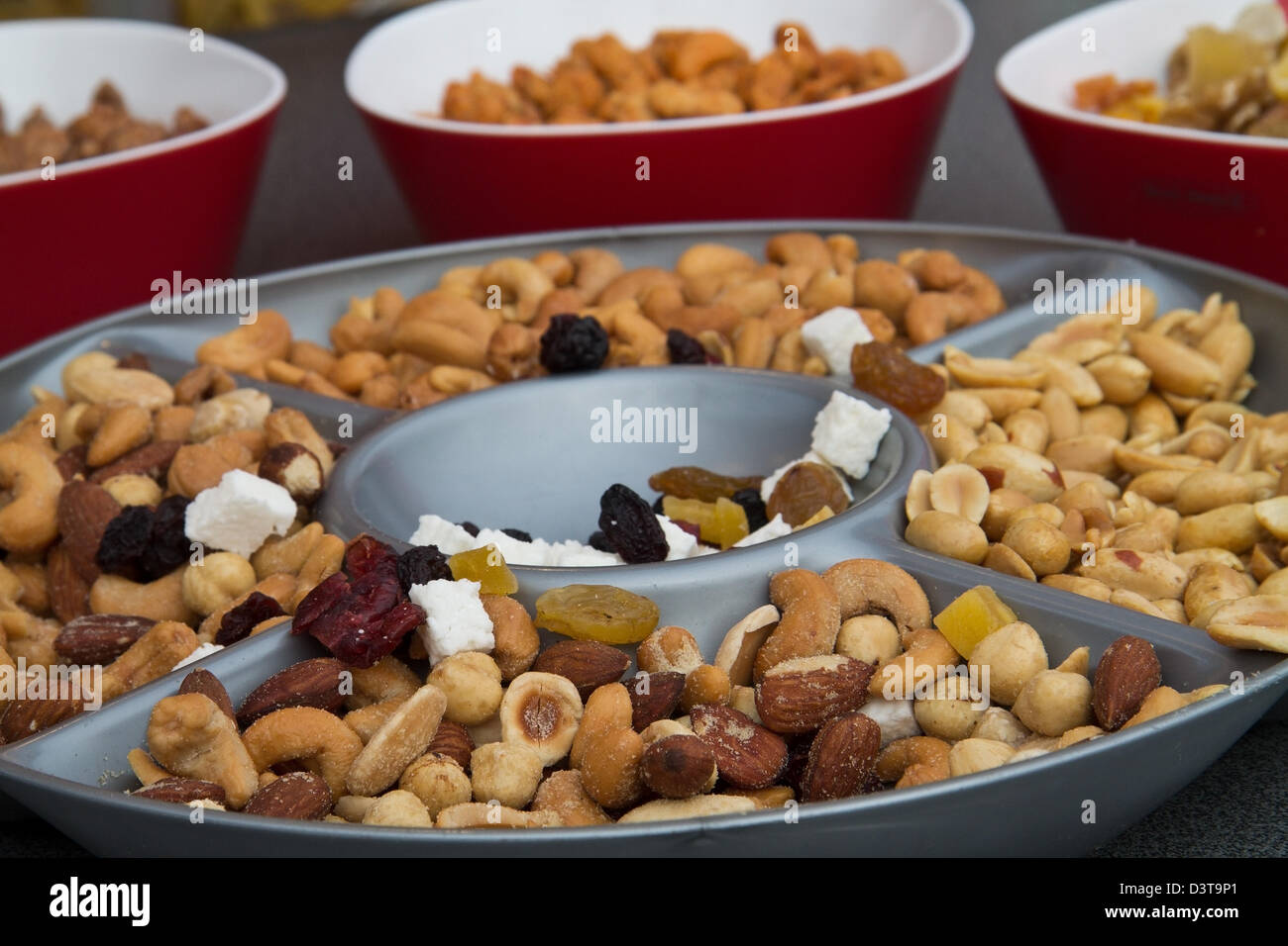 Assorted nuts in different containers Stock Photo - Alamy