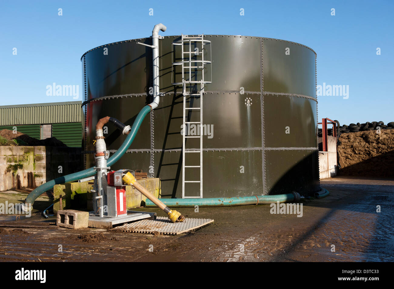 Slurry storage tower, with slurry stirrer attached. Cumbria, UK Stock ...