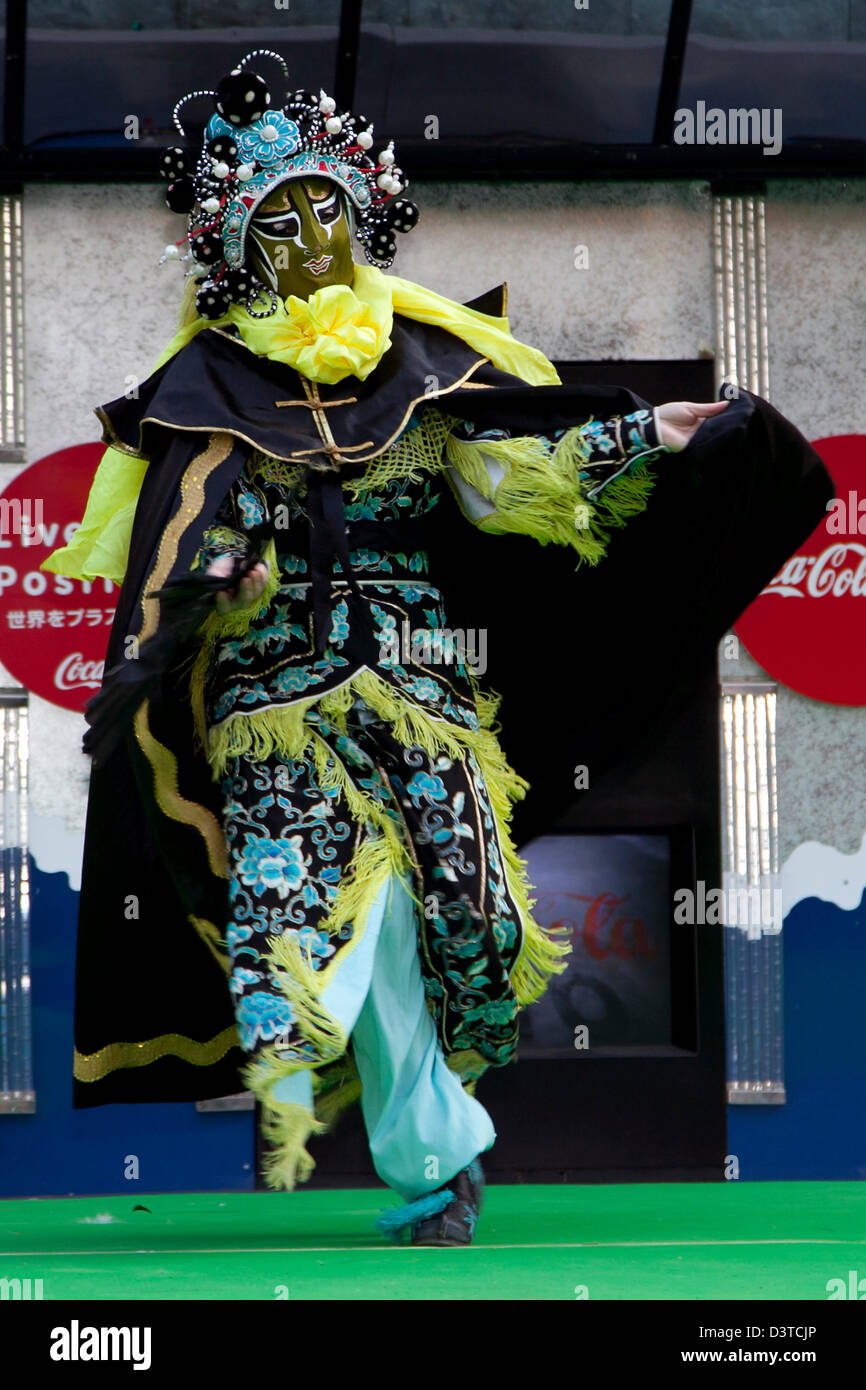 Kanagawa, Japan. 23rd Feb, 2013. A woman performs a Chinese mask ...
