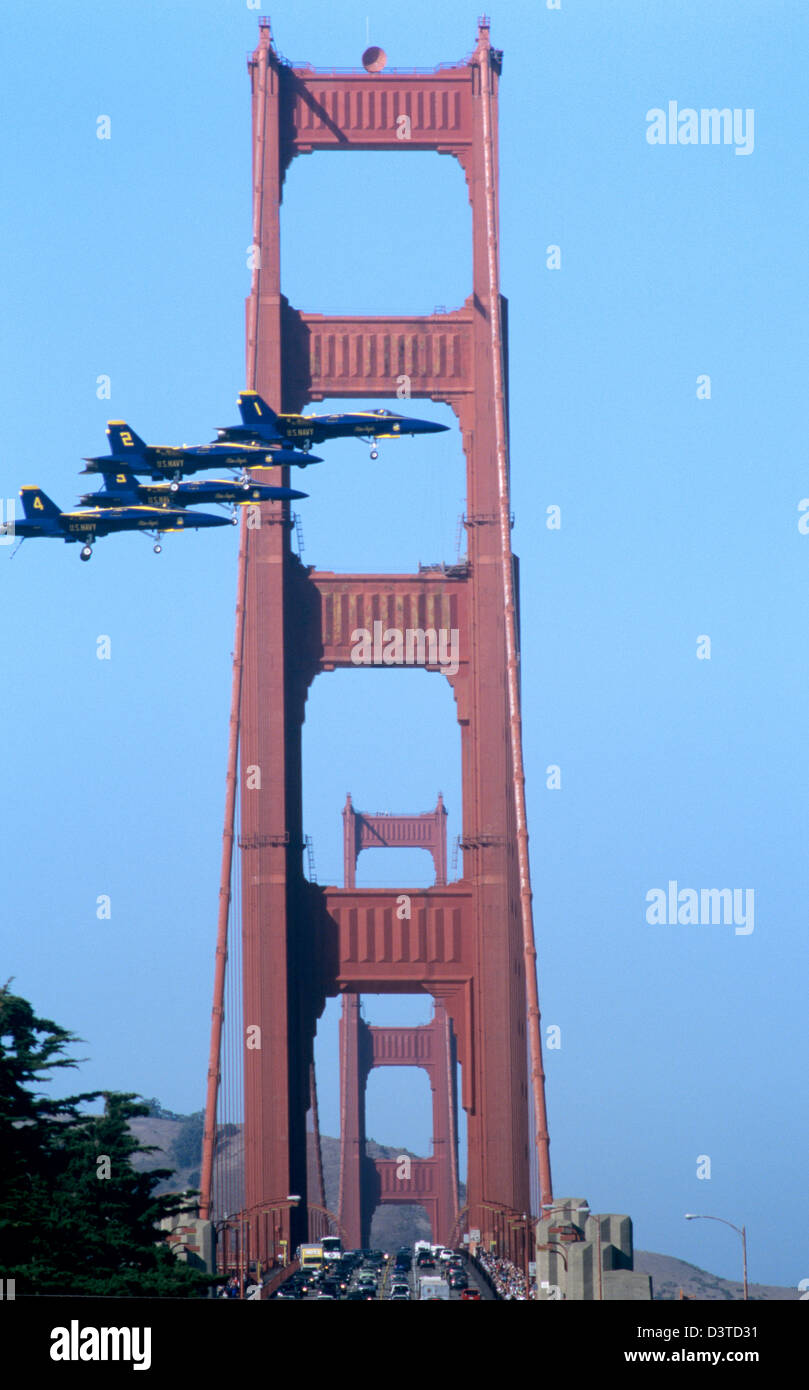 blue angels fly past golden gate bridge tower during fleet week in San ...
