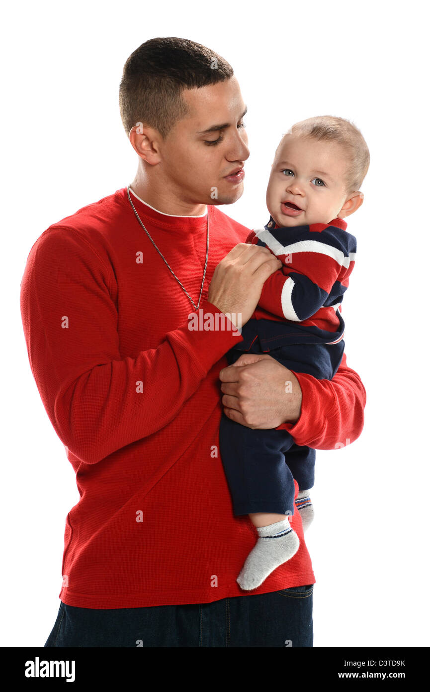 Hispanic father holding son isolated over white background Stock Photo ...