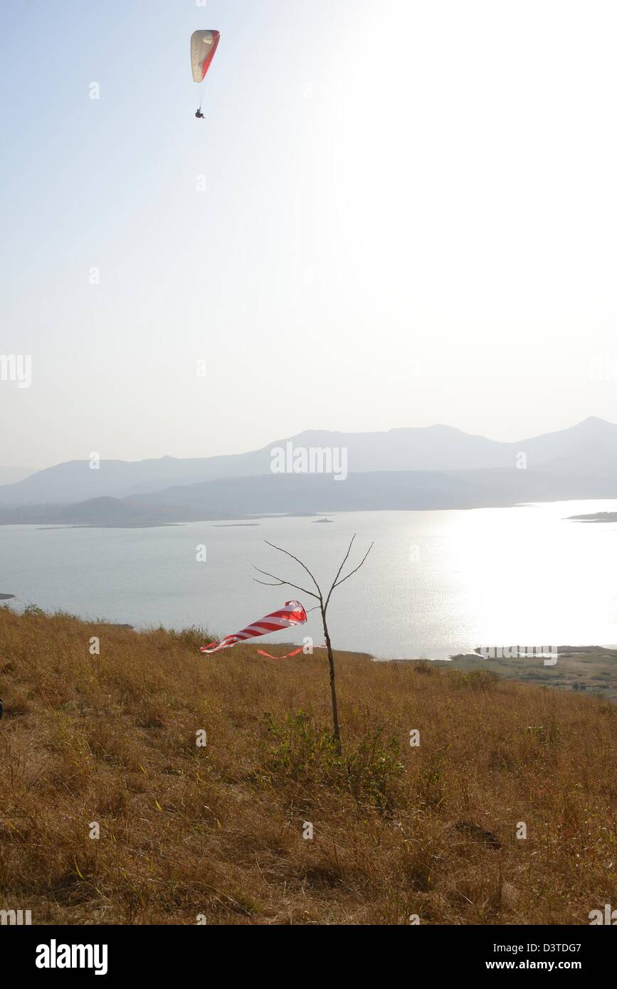 Windsock with paraglider Stock Photo - Alamy