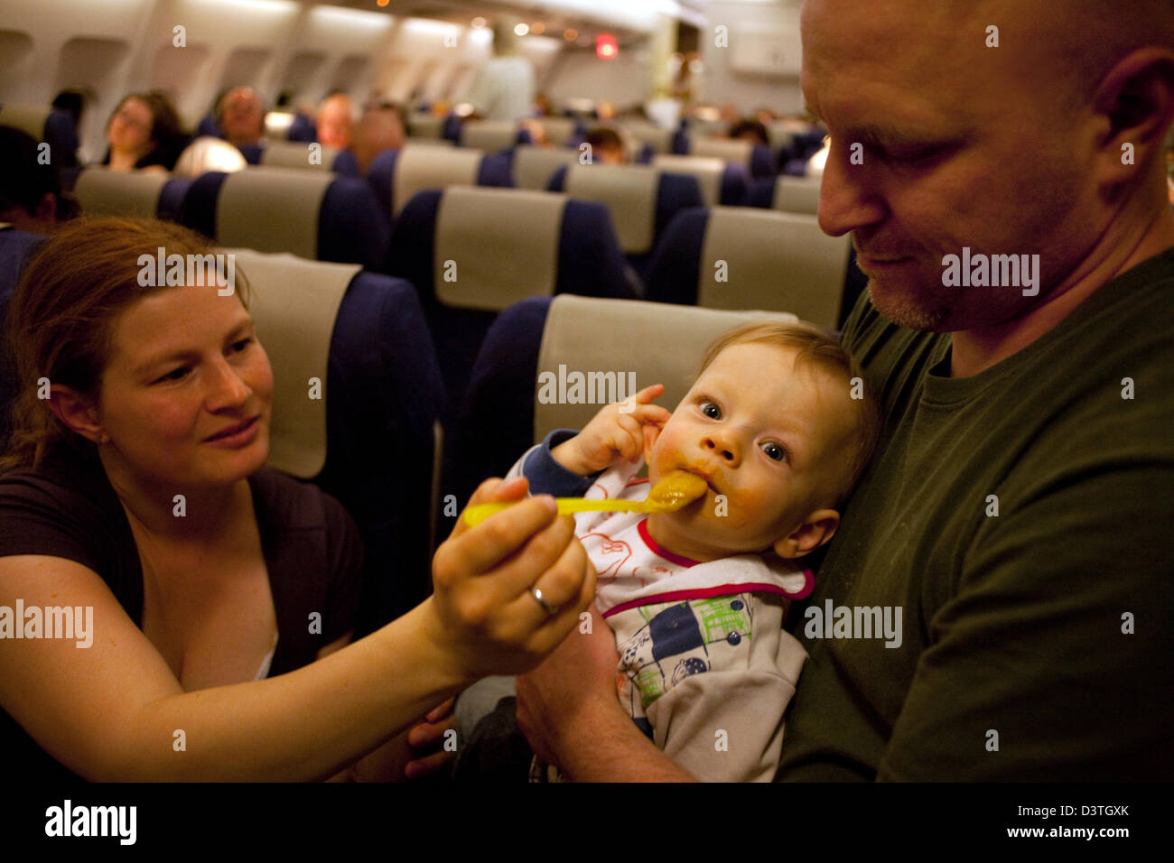Berlin, Germany, Family with small child on a plane Stock Photo - Alamy