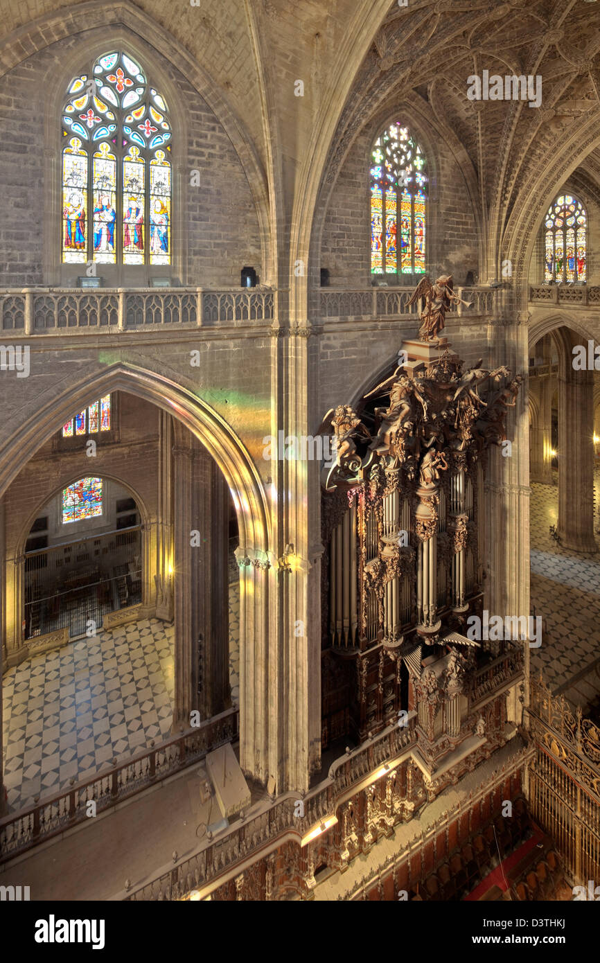 Seville, Spain, the organ with carved wooden angels in the Santa Maria ...
