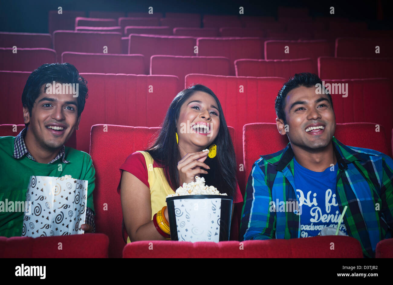 Indian friends enjoying movie hi-res stock photography and images - Alamy